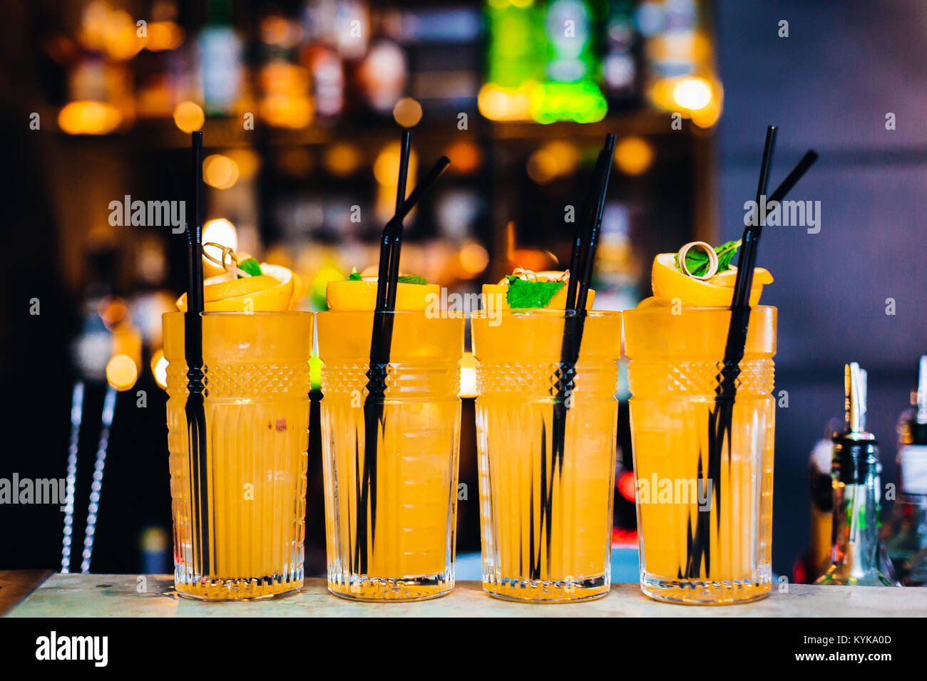 Vibrant Cocktail Selection at the Bar with Colorful Garnishes and Stylish Glassware in a Modern ...