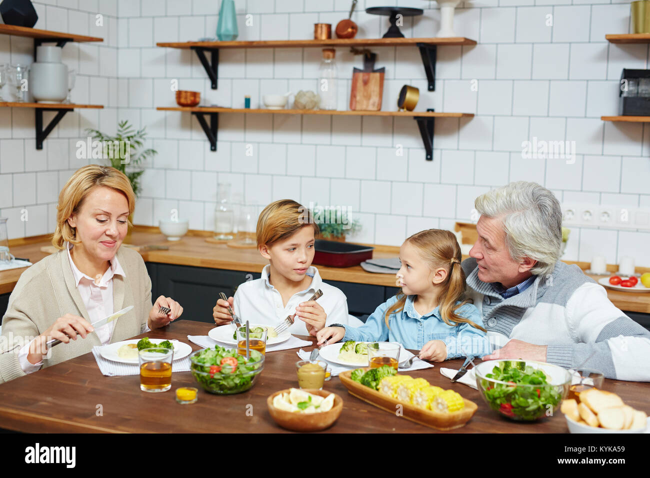 Dining in the kitchen Stock Photo - Alamy