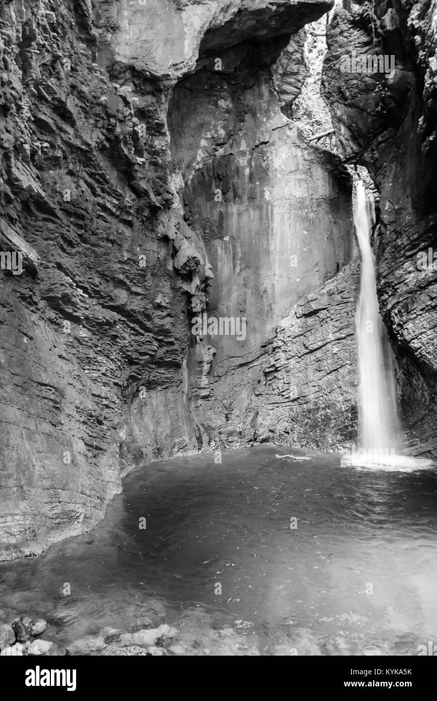 Waterfall flowing turquoise pool Black and White Stock Photos & Images ...