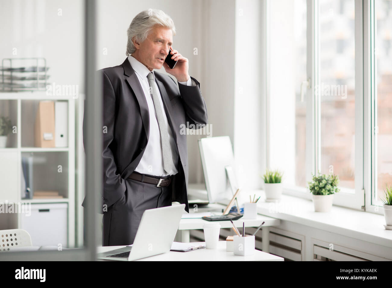 Calling in office Stock Photo - Alamy