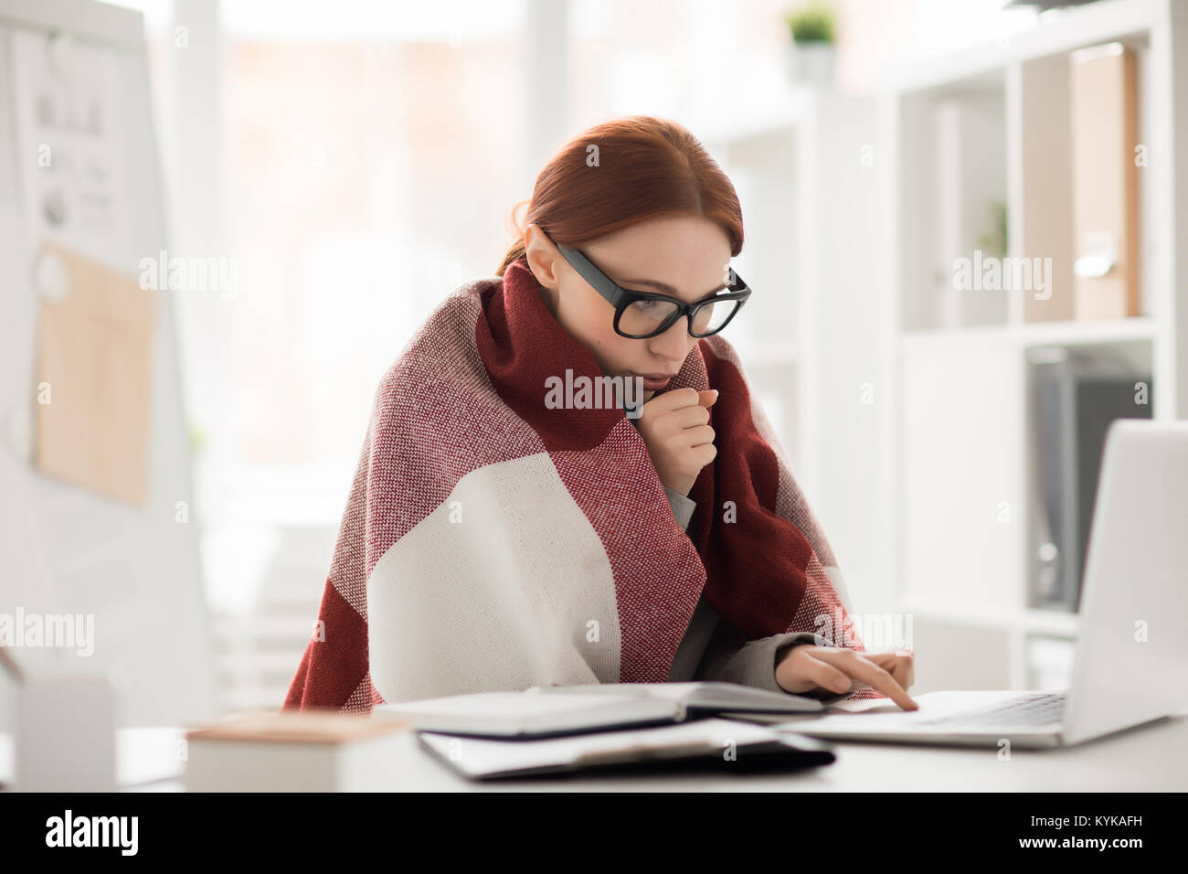 Cold office woman hi-res stock photography and images - Alamy