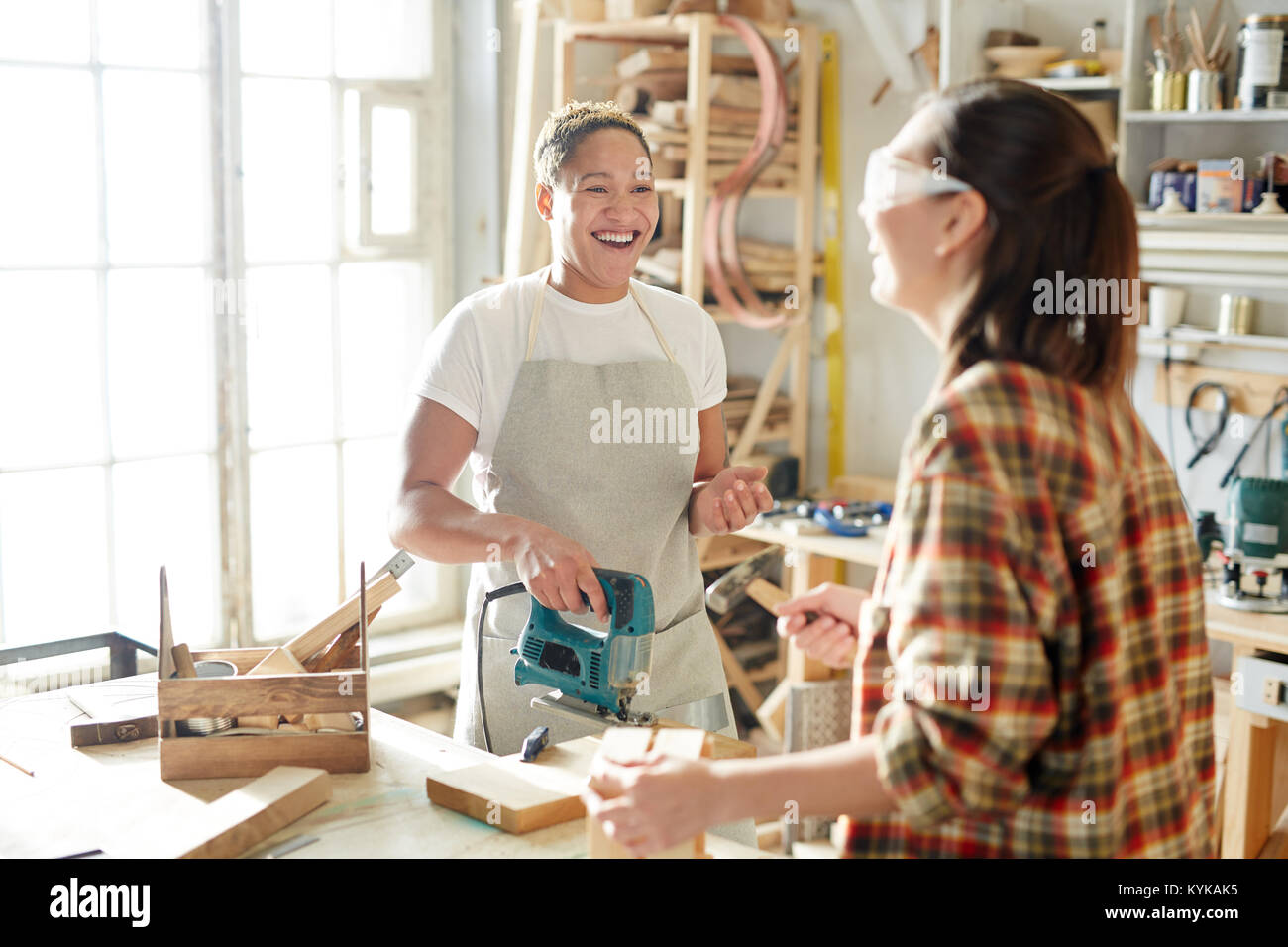 Woman happy with carpenter hi-res stock photography and images - Alamy