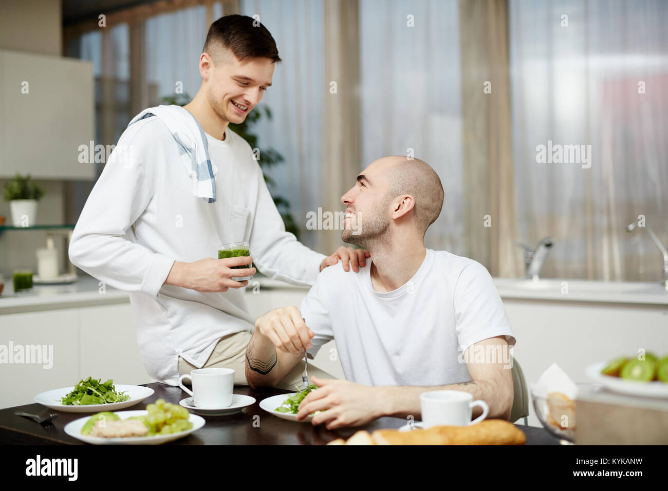 Talking by breakfast Stock Photo - Alamy