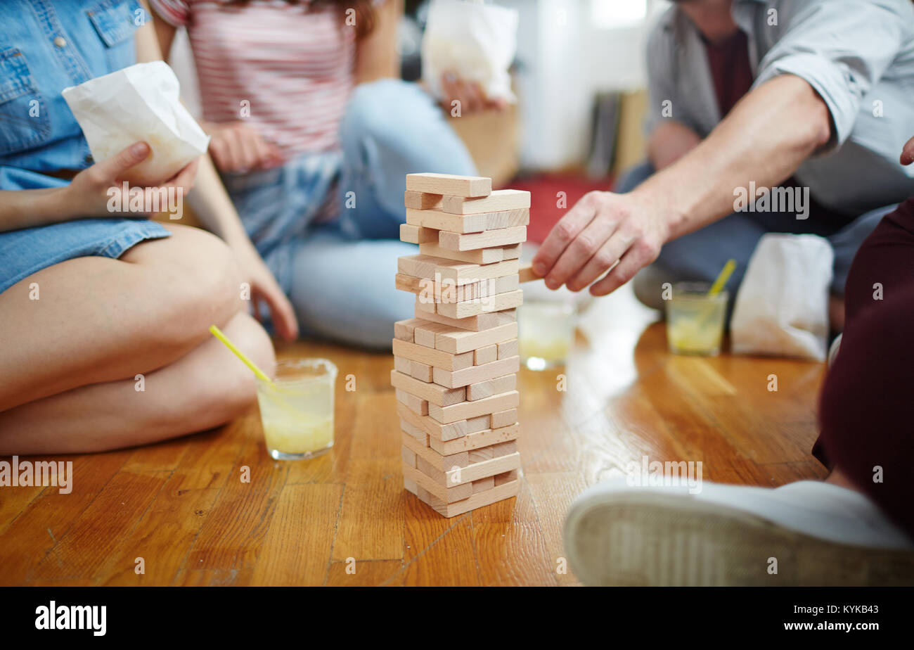 Taking brick out Stock Photo - Alamy