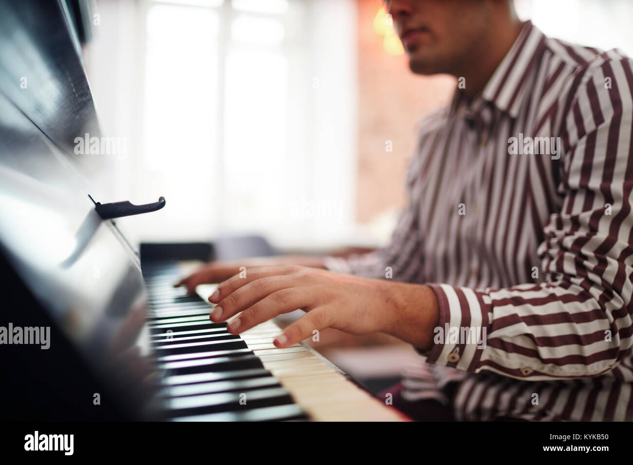 Person playing piano hi-res stock photography and images - Alamy