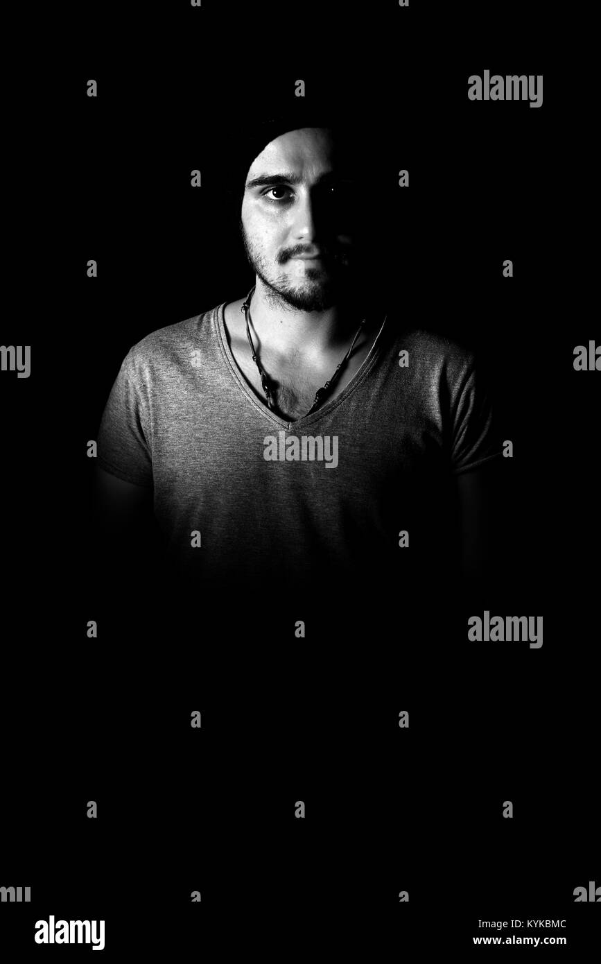 Rock singer portrait, with leather jacket and a cool attitude on black ...