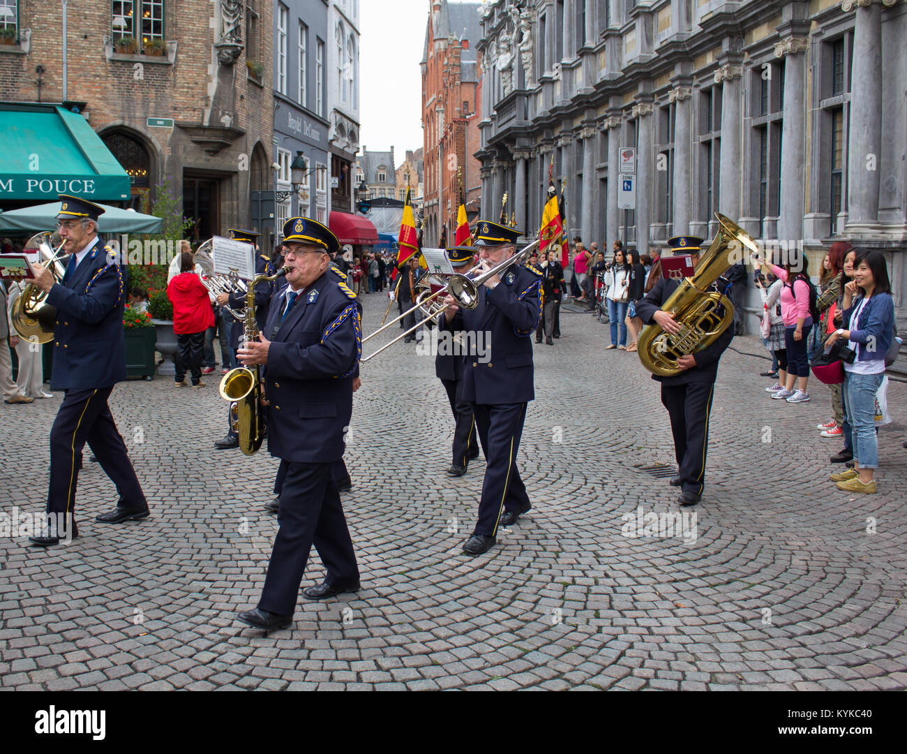 Bruges, Belgium - July 21, 2011: A band march in front of world war 2 ...