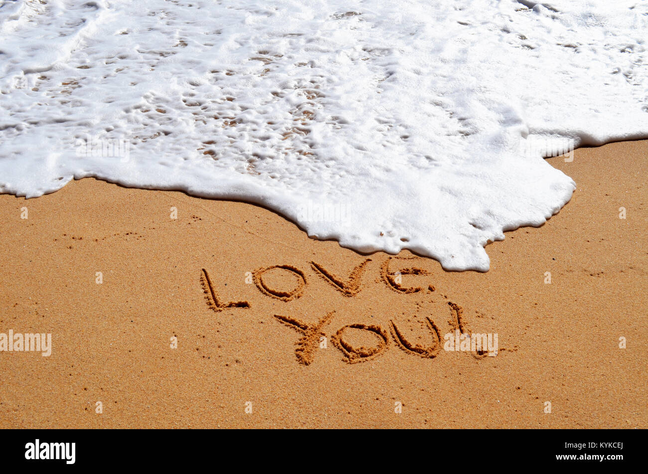 Hand written in sand hi-res stock photography and images - Alamy