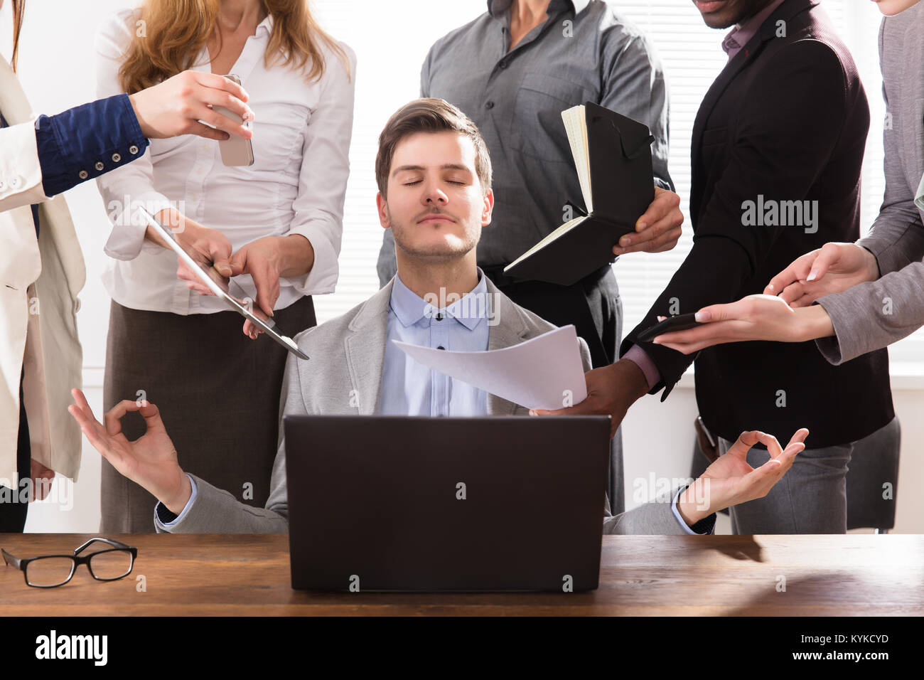 Person with a lot of hands hi-res stock photography and images - Alamy
