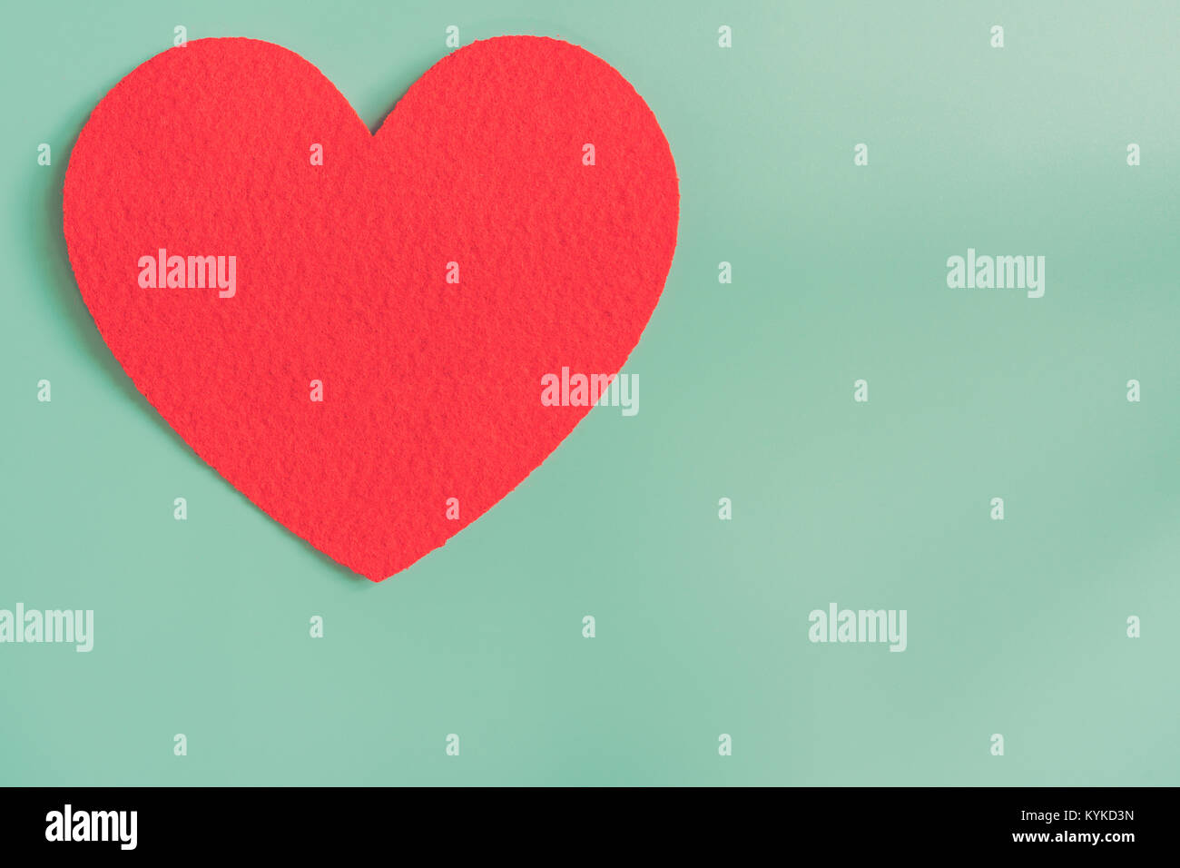 red heart on pastel color background with space Stock Photo - Alamy
