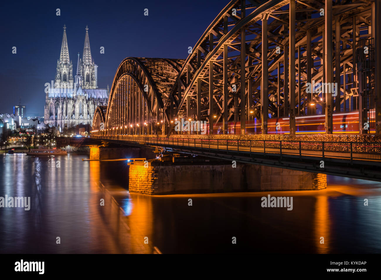 Cologne Cathedral and Hohenzollern Bridge in Cologne, Germany Stock ...