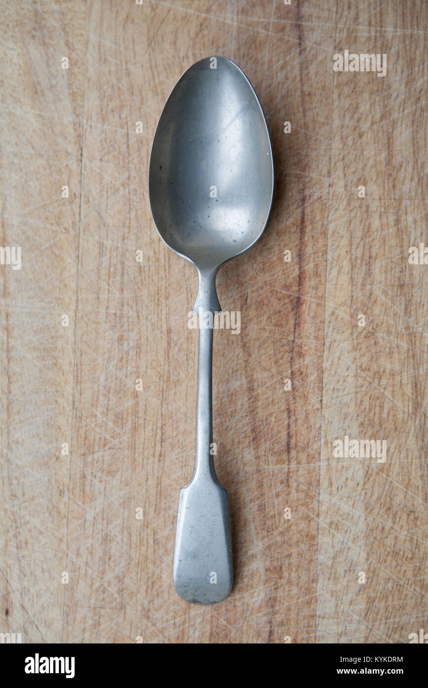 Dull spoon on board hi-res stock photography and images - Alamy