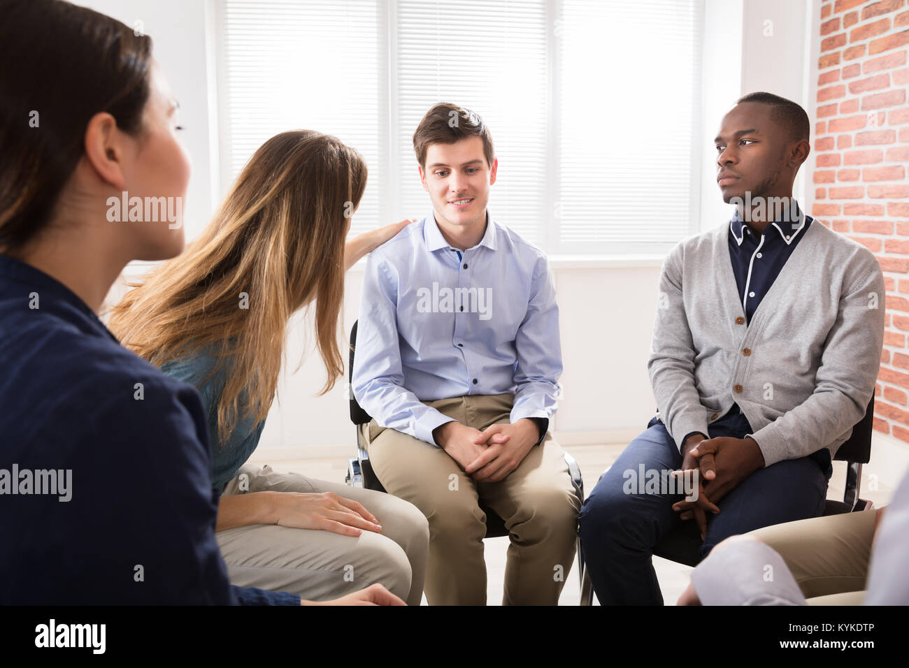 Depressed woman group therapy hi-res stock photography and images - Alamy