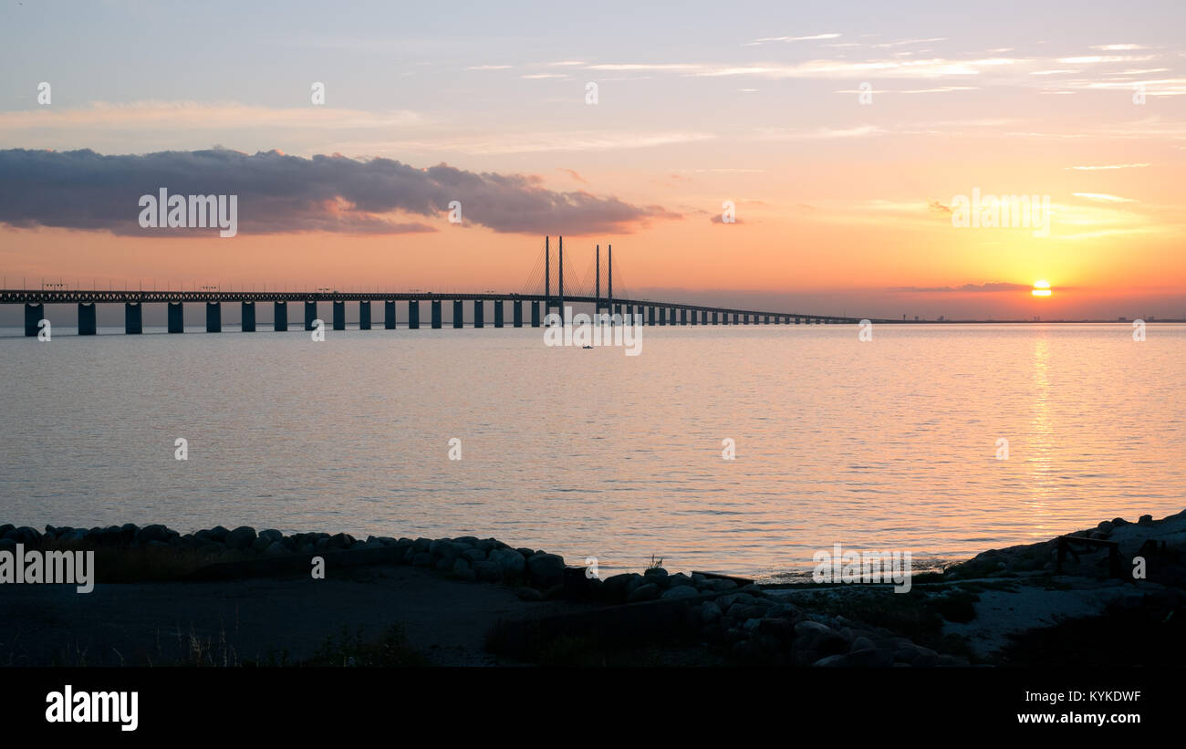 Oresund and Oresund Bridge at dusk viewed from Limhamn in Malmo, Sweden ...