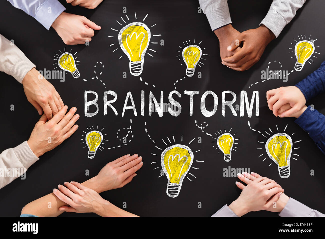 Close-up Of Hands With Brainstorm Concept Drawn On Blackboard Stock ...