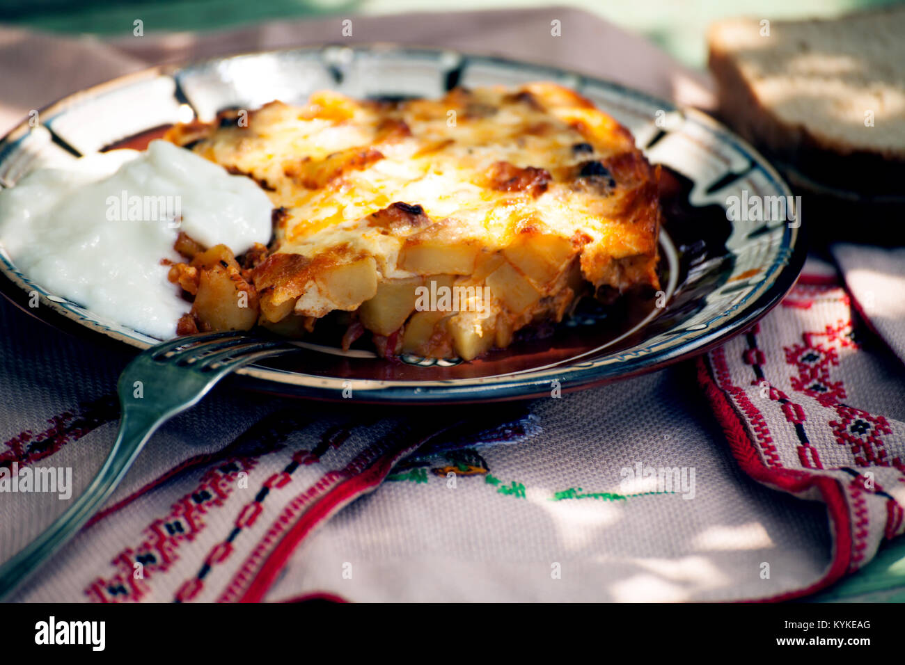 traditional bulgarian musaka meat with yogurt dressing Stock Photo - Alamy
