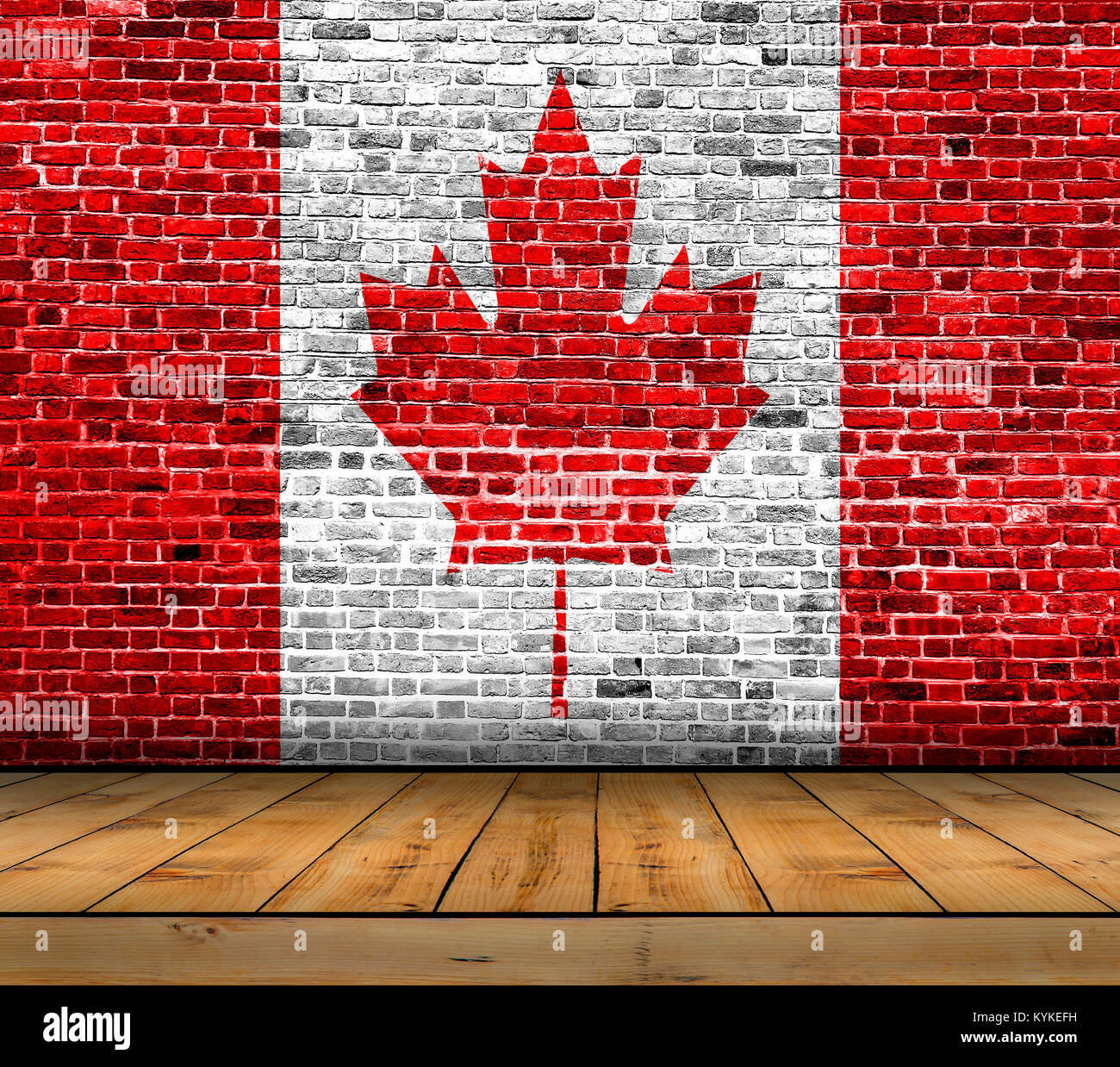 Canada flag painted on brick wall with wooden floor Stock Photo - Alamy