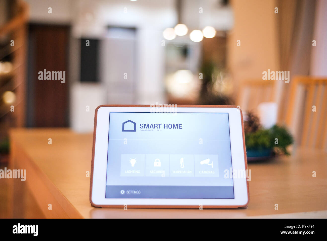 A tablet with smart home screen Stock Photo - Alamy