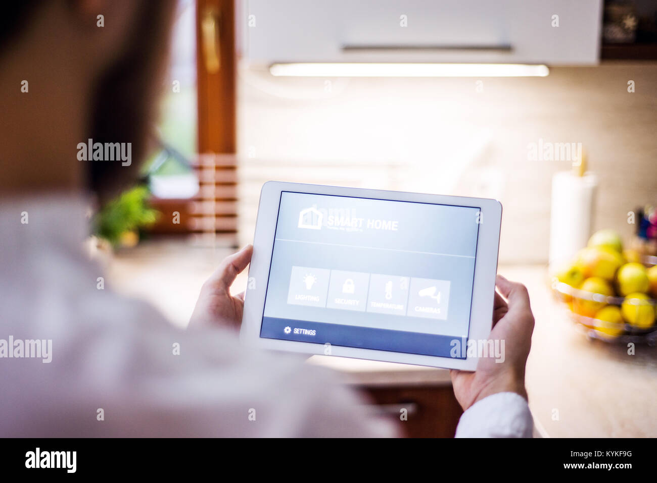 A tablet with smart home screen Stock Photo - Alamy