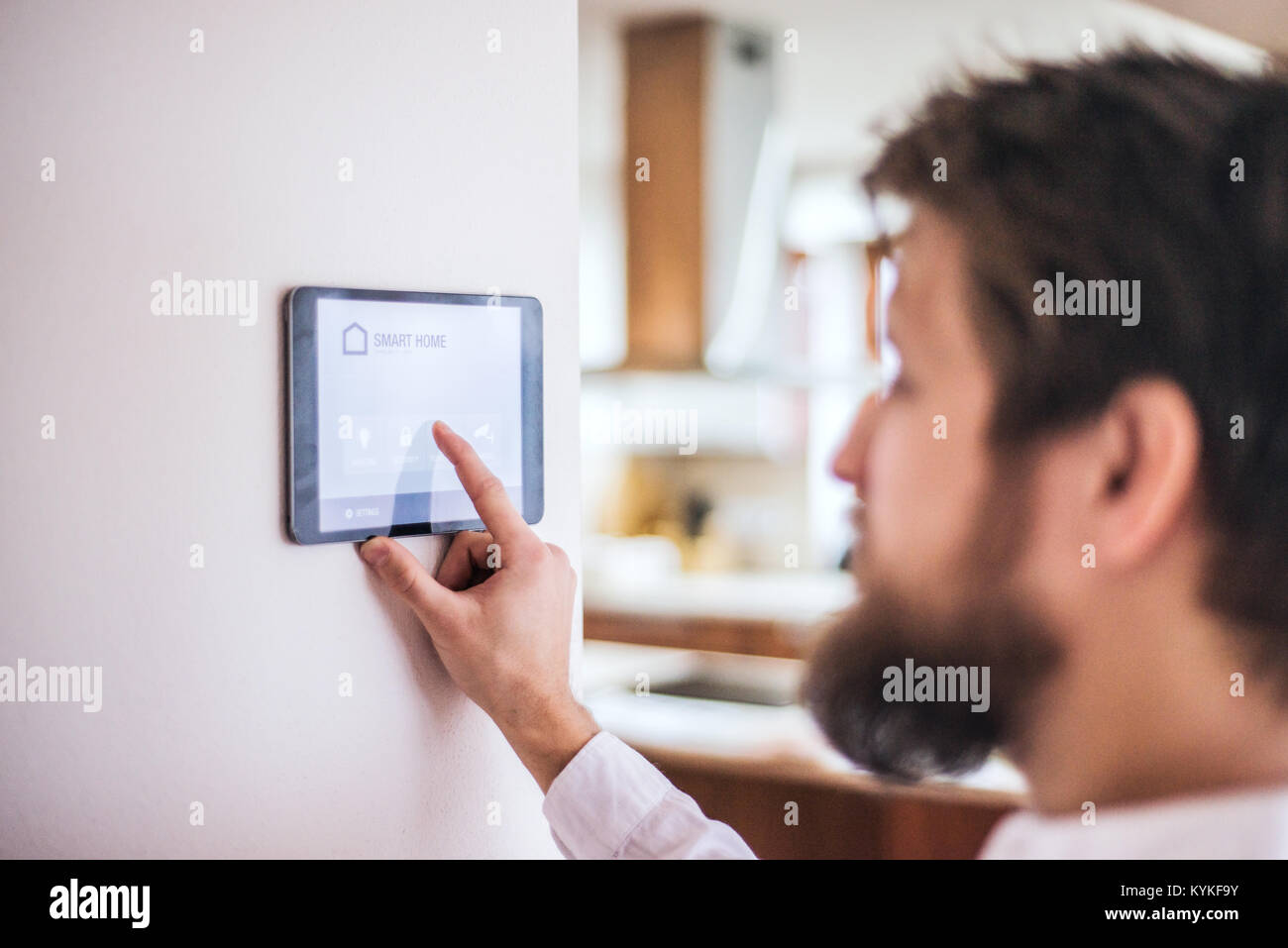 A tablet with smart home screen Stock Photo - Alamy