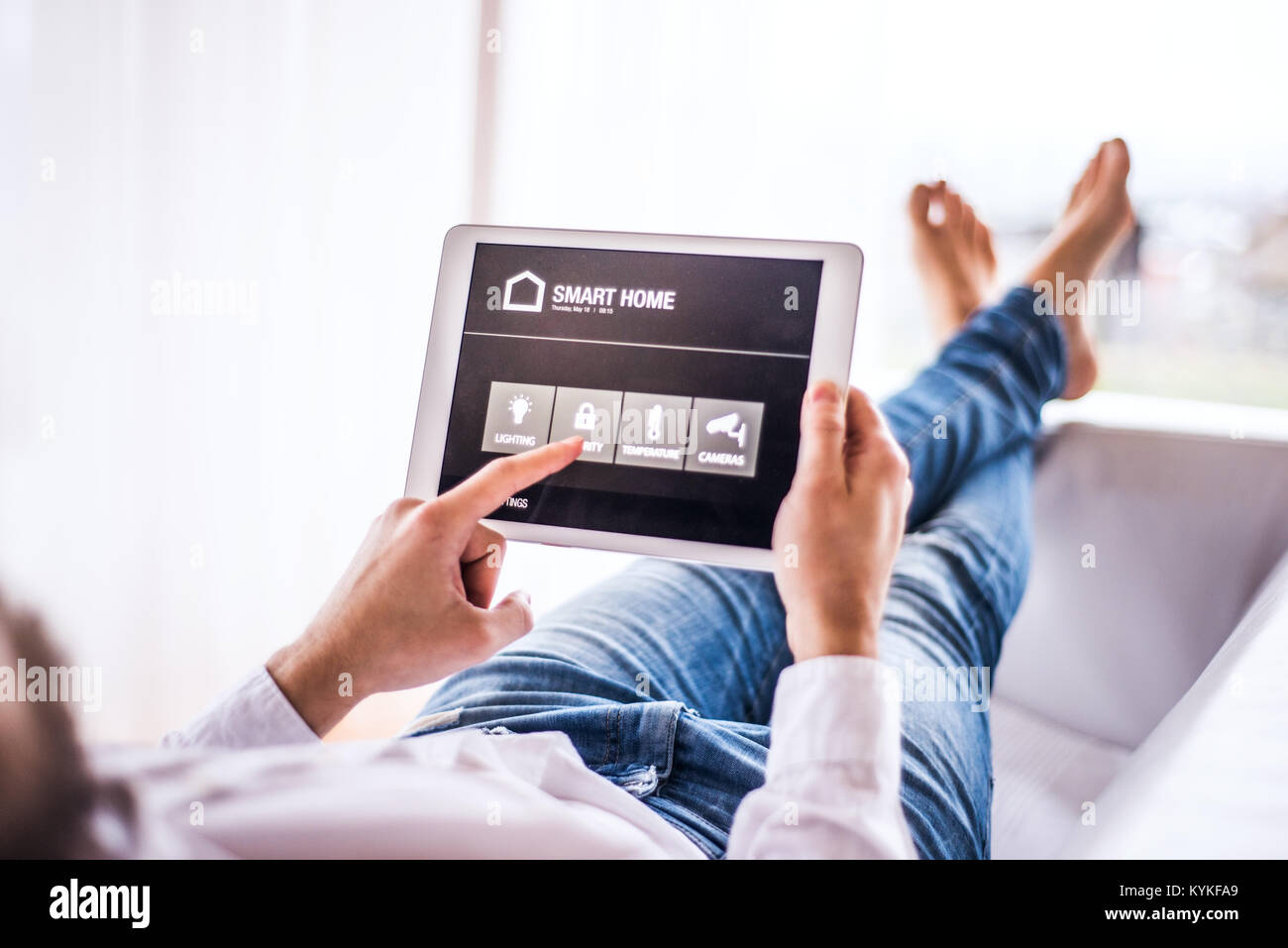 A tablet with smart home screen Stock Photo - Alamy