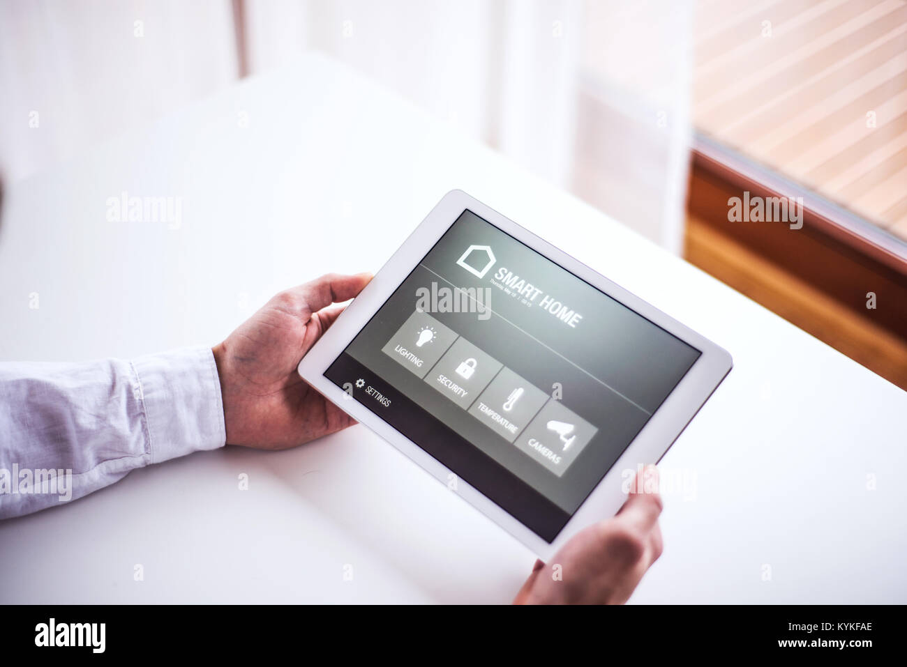 A tablet with smart home screen Stock Photo - Alamy