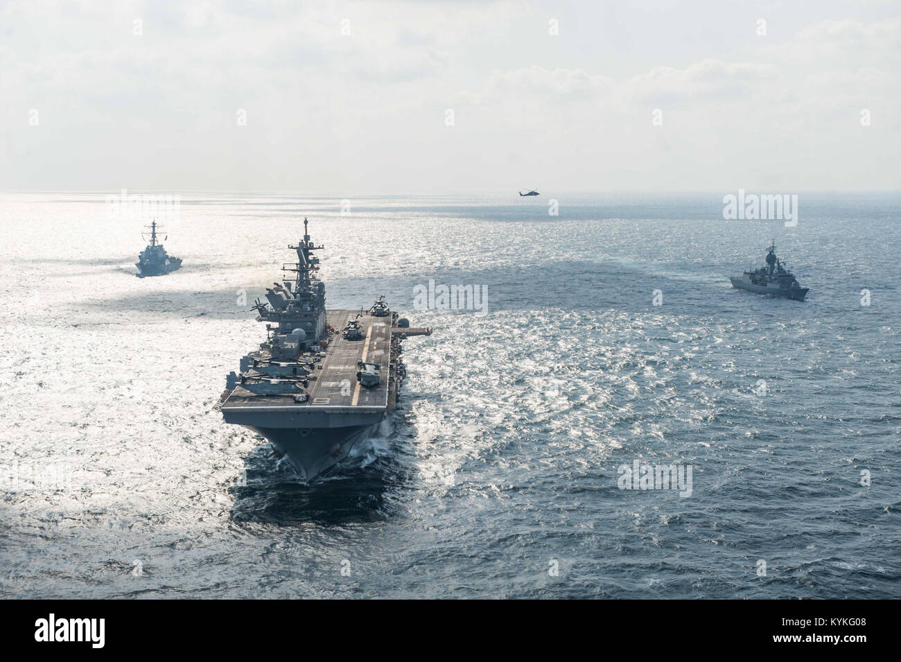 The USS America (LHA 6), USS Hopper (DDG 70), and HMAS Warramunga (FFH ...
