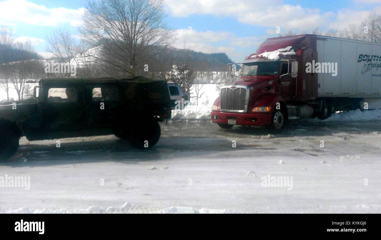 Sgt. Mark Boggs, Battery C, 2nd Battalion 138th Field Artillery uses a ...