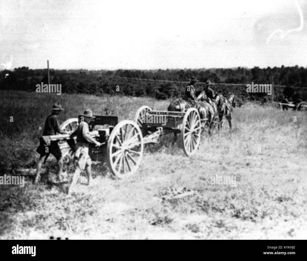 Vintage black and white image of US mounted cavalry pulling field gun ...