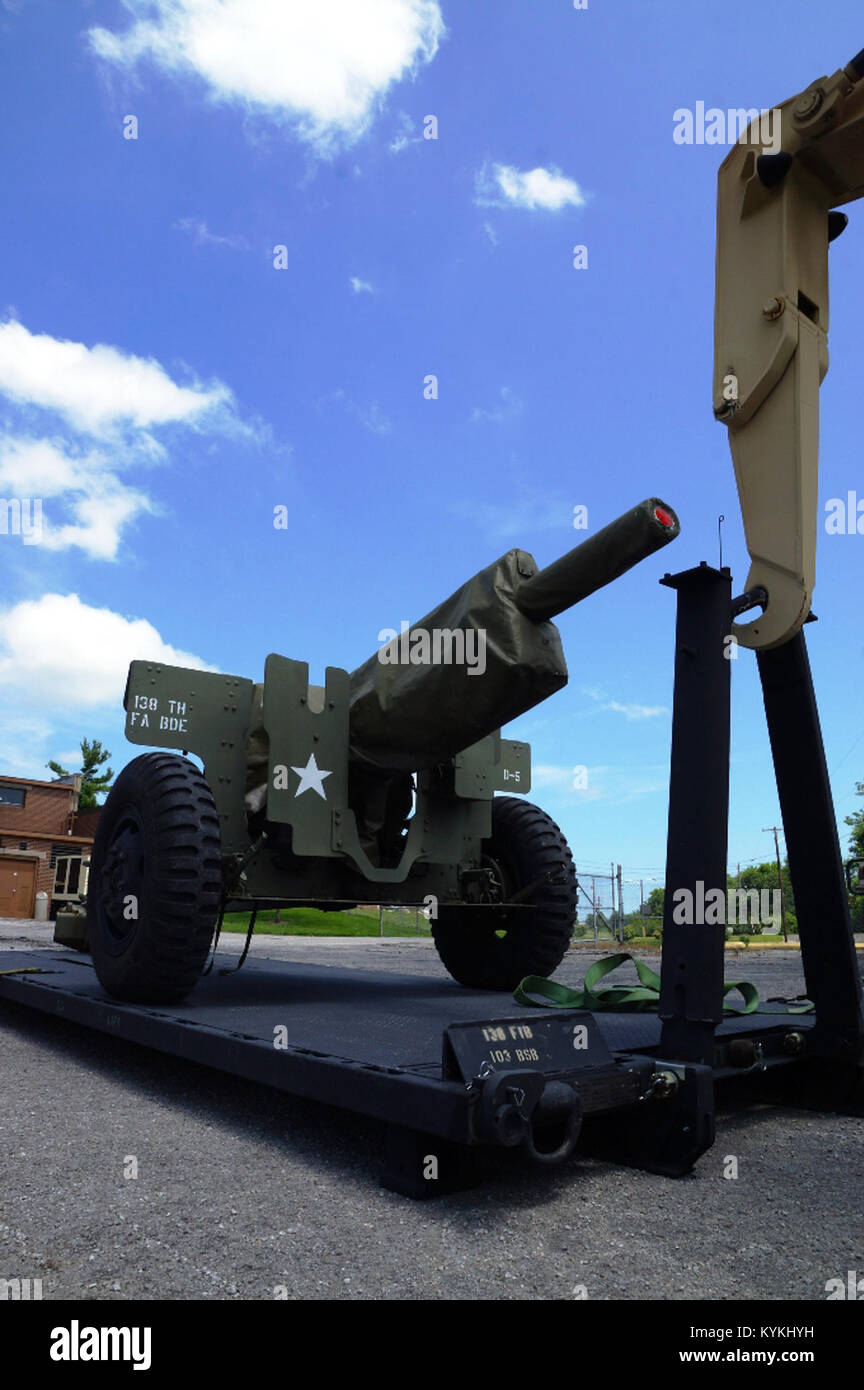A105 millimeter howitzer canon sits atop a transport trailer in ...