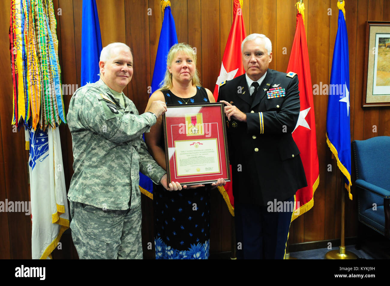 Col. Martin Carpenter and his wife, Shannon are honored during a ...