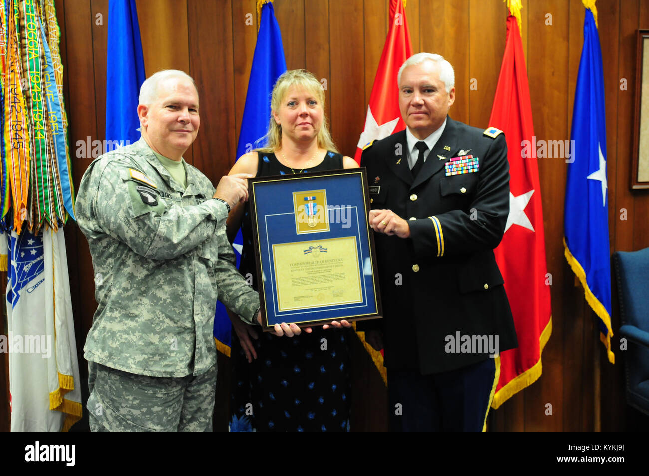 Col. Martin Carpenter and his wife, Shannon are honored during a ...