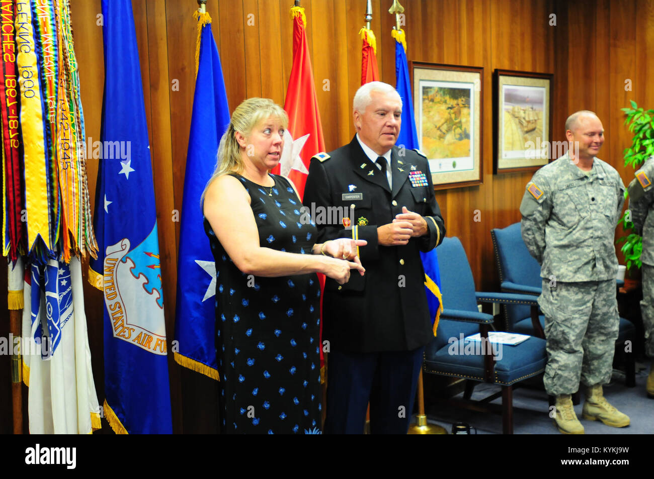 Col. Martin Carpenter and his wife, Shannon are honored during a ...