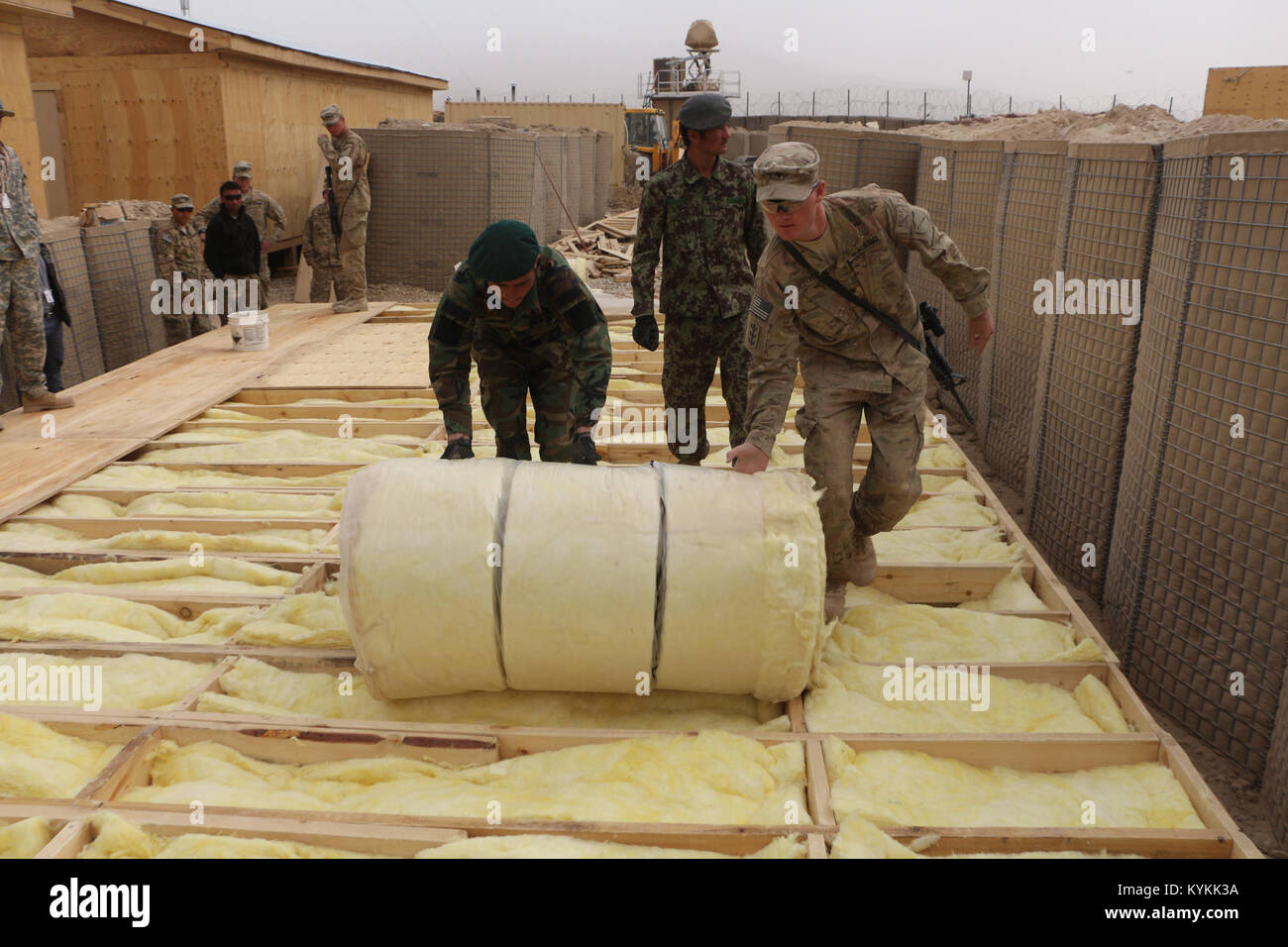Spc. Clyde Porter with the 149th Vertical Construction Company along ...