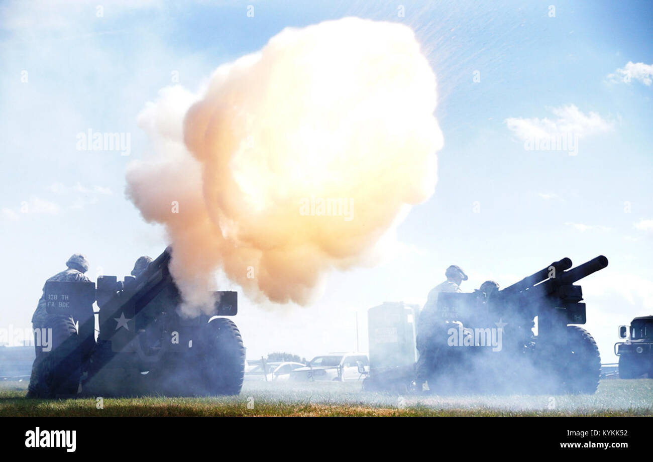 A 105-millimeter howitzer canon fires to mark the Changing of ...