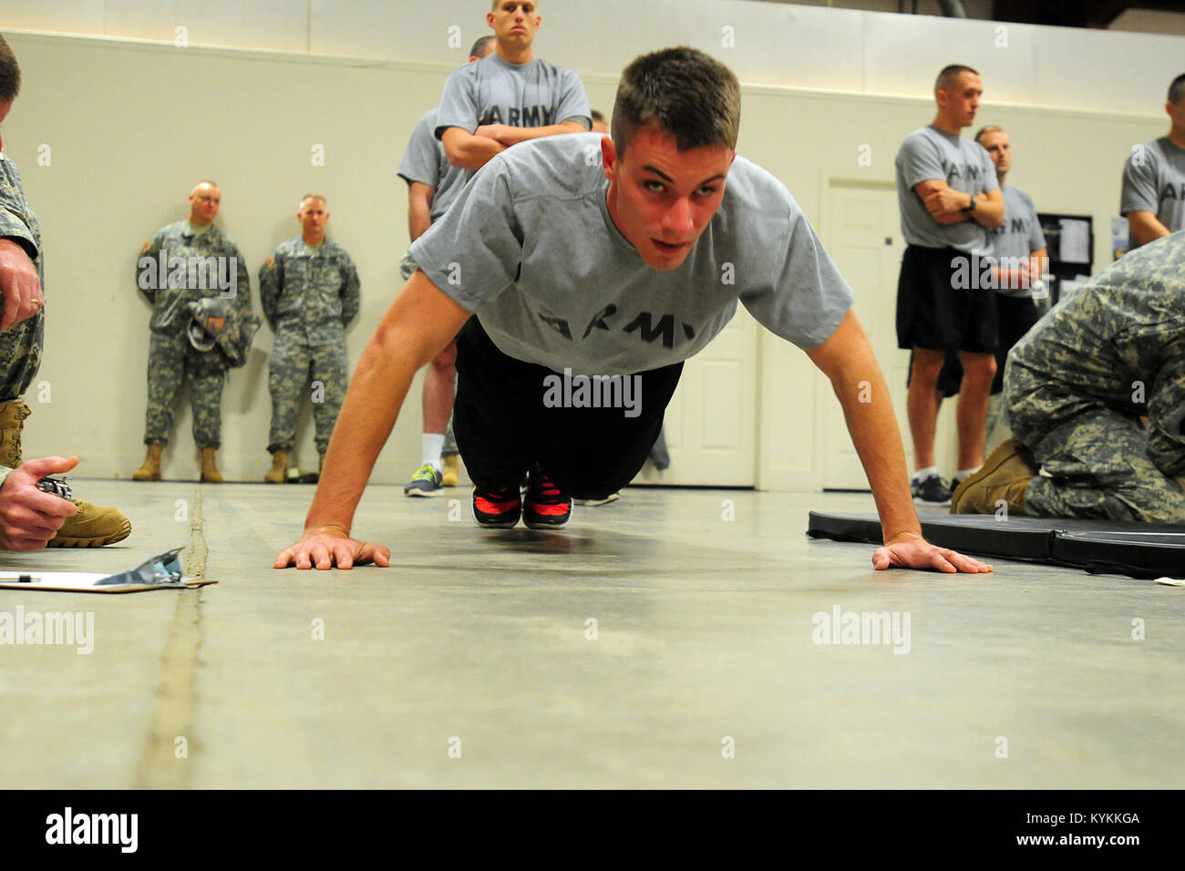 Spc. Benjamin Joynt prepares to begin his push-ups during an Army ...