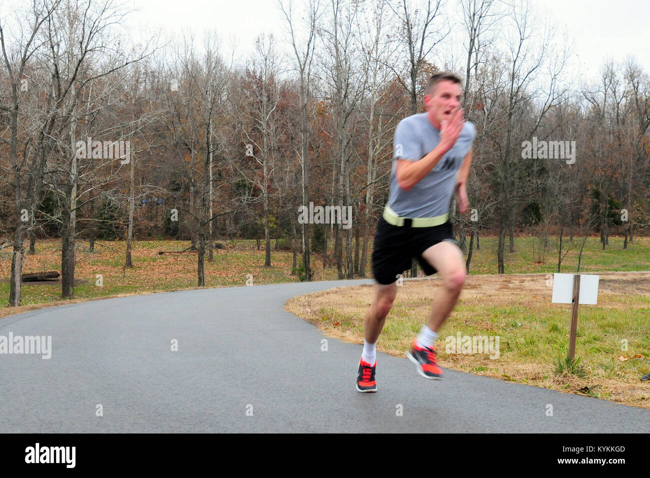 Spc. Benjamin Joynt sprints to the finish of the 2.5 mile run of an ...