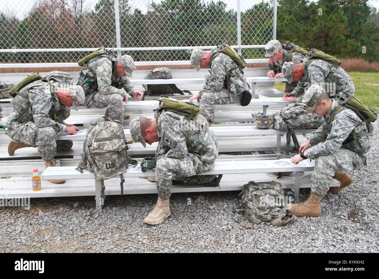 Soldiers plot points on maps during the land navigation portion of the ...
