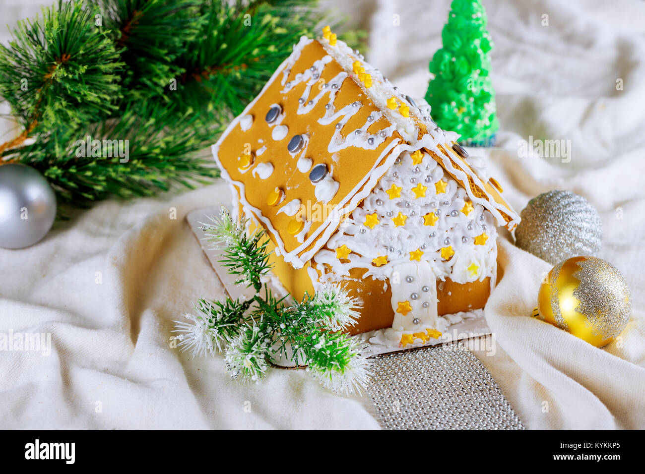 Gingerbread house on a festive Christmas snow background Stock Photo ...