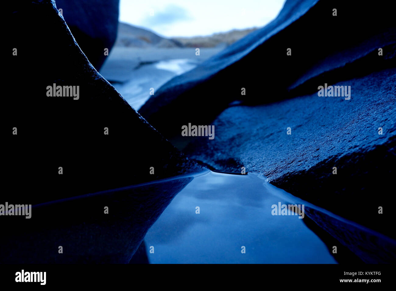 Beautiful pool of water on beach Stock Photo - Alamy