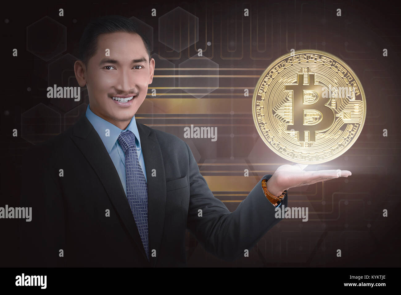 Asian businessman showing Bitcoin icon as virtual money against circuit ...