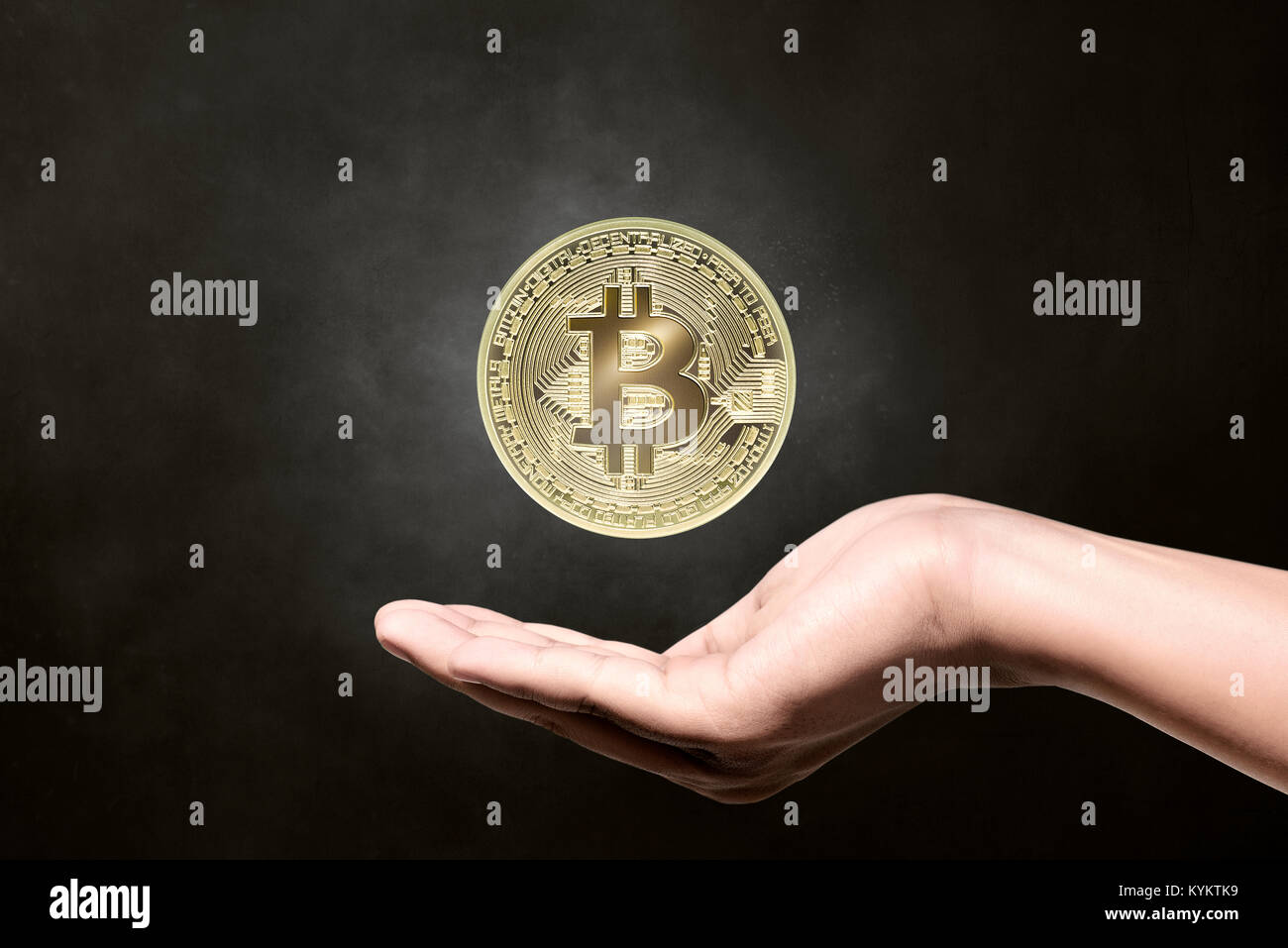 Man hand hold bitcoin. Cryptocurrency image concept Stock Photo - Alamy