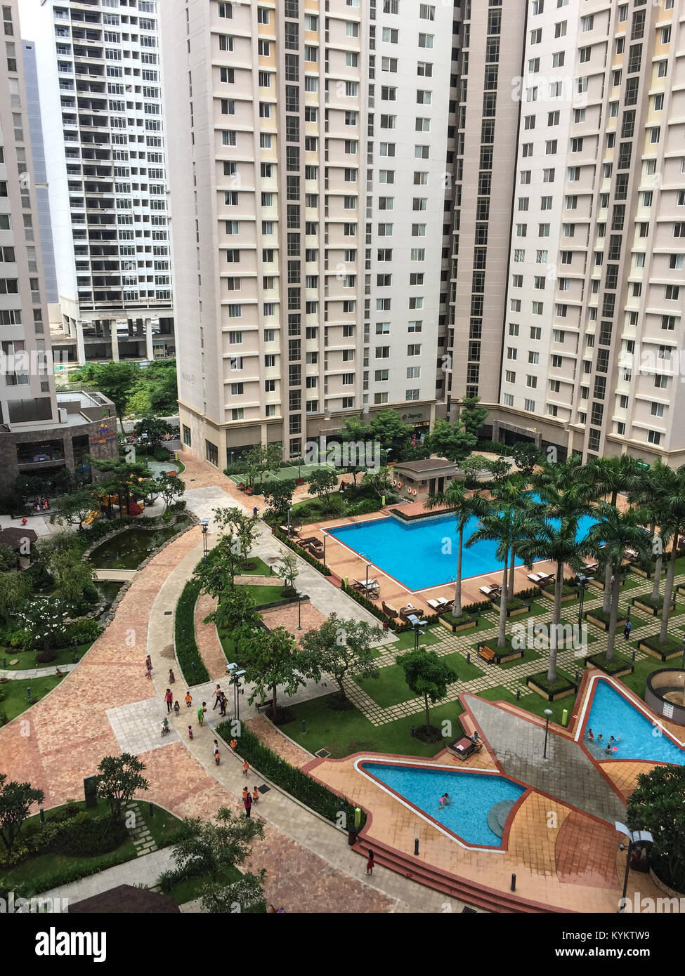 Saigon, Vietnam - May 22, 2015. Modern apartments with swimming pool at ...