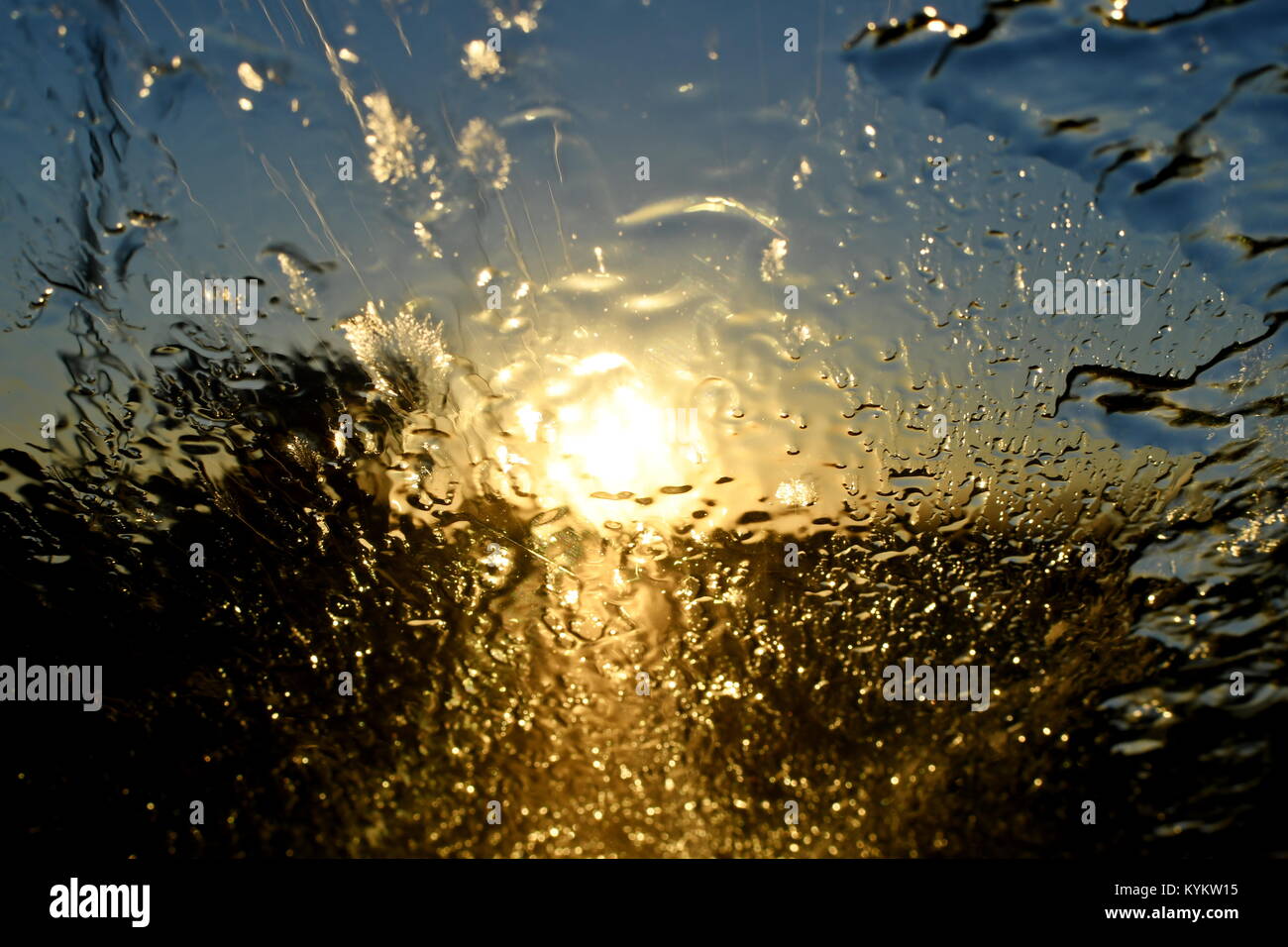 Liquid Sunset while driving west Stock Photo - Alamy
