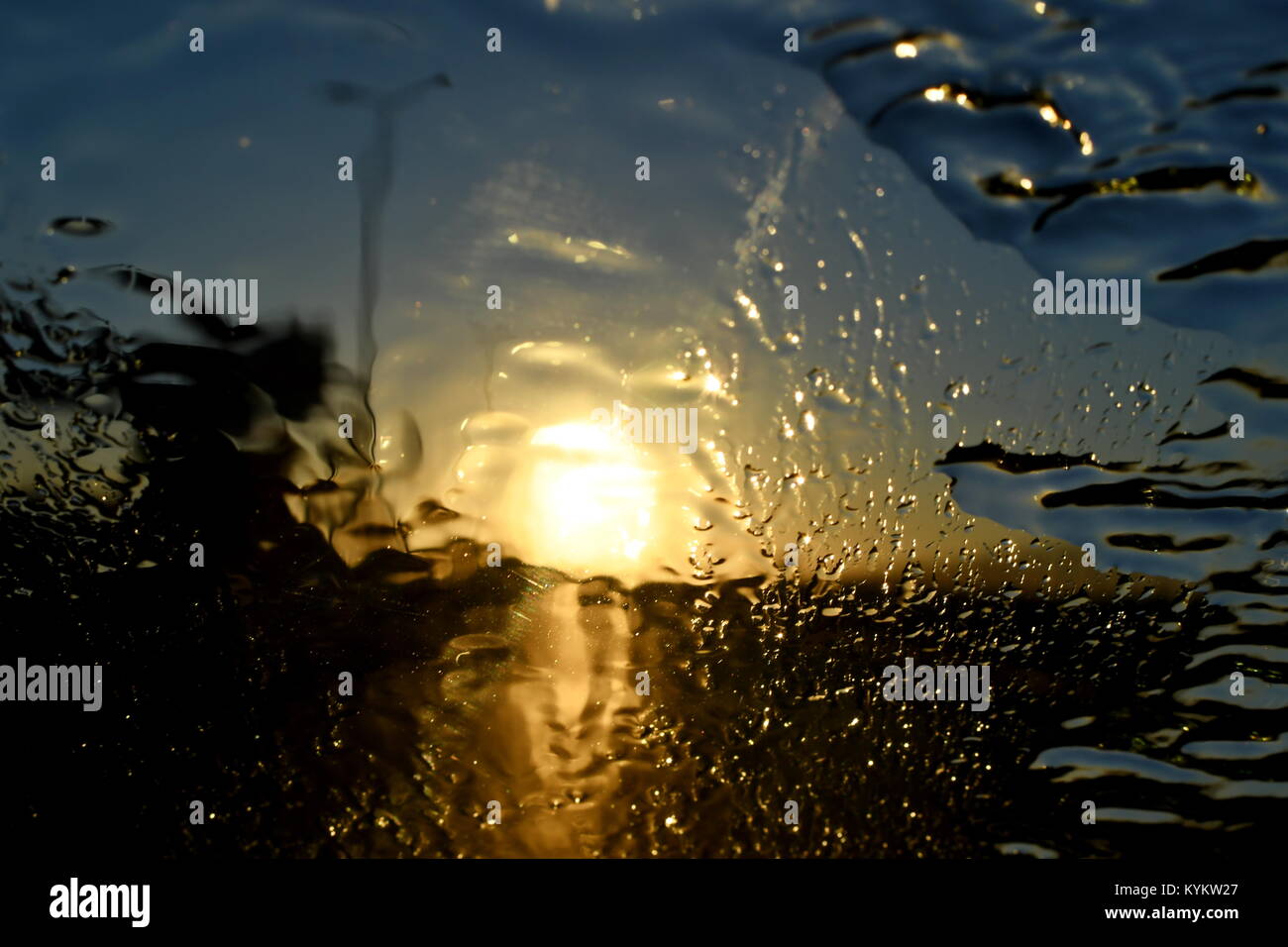 Liquid Sunset while driving west Stock Photo - Alamy