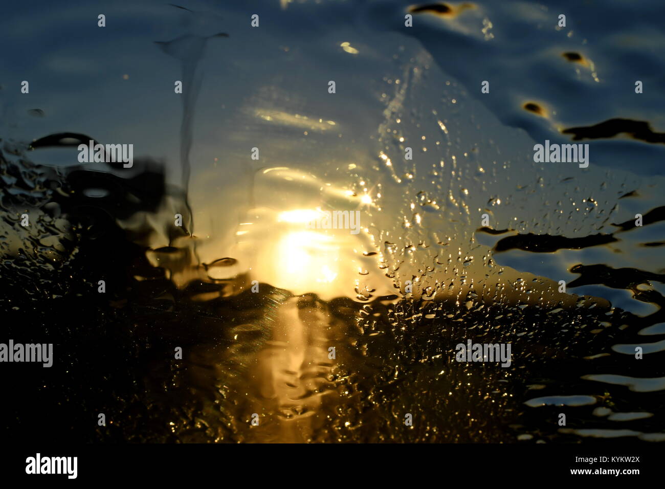Liquid Sunset while driving west Stock Photo - Alamy