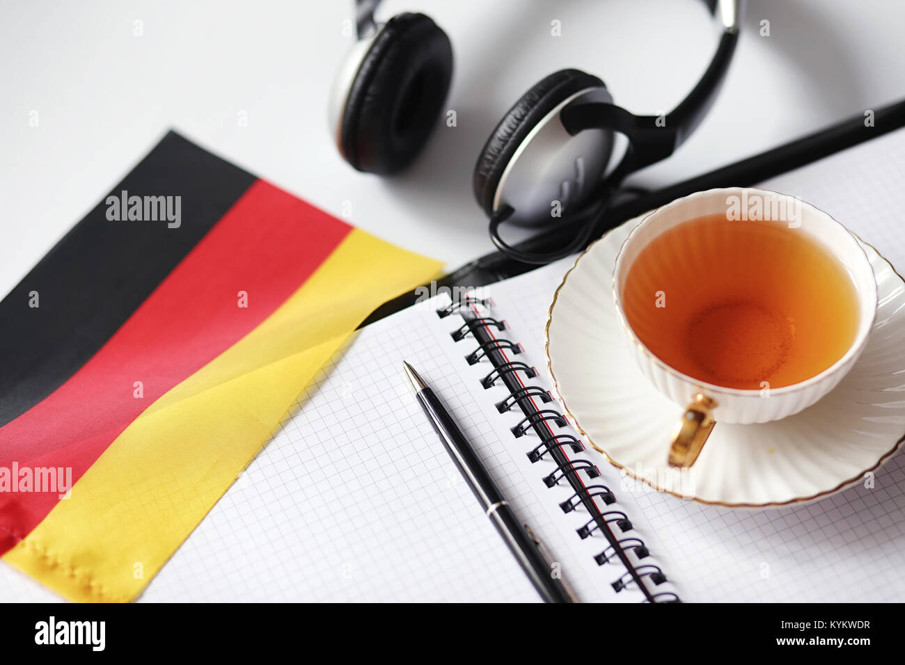 Learning foreign languages. Notepad for entries and a flag. Lang Stock ...