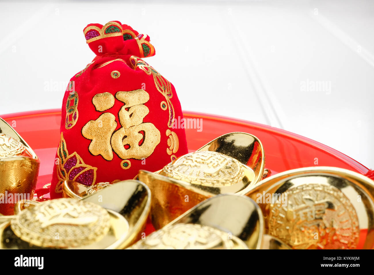 Chinese New year ang pow red felt fabric bag with gold ingots in red ...