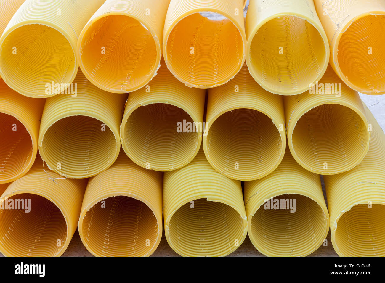 Yellow drain pipe - construction site Stock Photo - Alamy