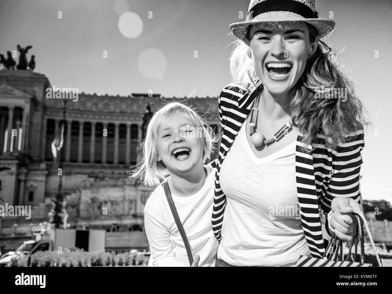 Roman Holiday. Portrait of smiling trendy mother and daughter tourists ...